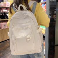 China Kids Backpack for School Cute Aesthetic Beige Backpack Girls Student Bookbag Women Travel Lightweight Nylon 12.2x7.0x16.9 Inch for sale