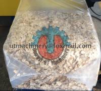 China Wood Packaging Material Sawdust Compression Machine 10kg Bagging for Horse Bedding for sale
