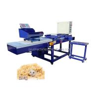 China Hydraulic Press Packing Machine For Wood Shavings Alfalfa Bag Packing 2000g Per Bag for sale