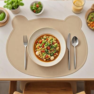 China Customized Silicone Food Grade Children'S And Toddler Meal Mats Without Bisphenol A Silicone Bear Shaped Table Mats for sale