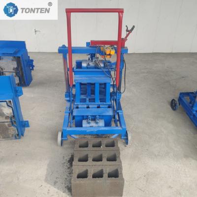 China Small-scale Hand-operated Non-fired Brick Press Cement Block Brick-making Machine for sale