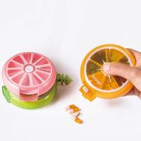 China 7 Cases Round Shape Pill Box With Weekly Pill Organizer Fruit color Pill case for sale