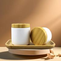 China Custom logo 60g 120g 200g 250g 500g HDPE Frosted Plastic Body Butter Cosmetic Face Cream Jar with Print Bamboo Lid for sale