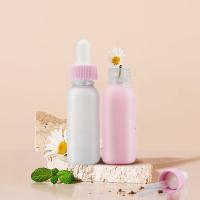 China Customize 30ml 1oz Plastic Pink White Cleaning PET Round Serum Dropper Bottle For Body Skin Care for sale