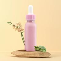 China Customize 30ml 1oz Plastic Pink White Cleaning PET Round Serum Dropper Bottle For Body Skin Care for sale