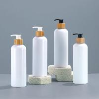 China Hot Sale Shea Butter Whitening Body Lotion Plastic Dispenser Face Lotion Pump Bottle with Bamboo Pump for sale