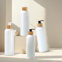 China Hot Sale Shea Butter Whitening Body Lotion Plastic Dispenser Face Lotion Pump Bottle with Bamboo Pump for sale