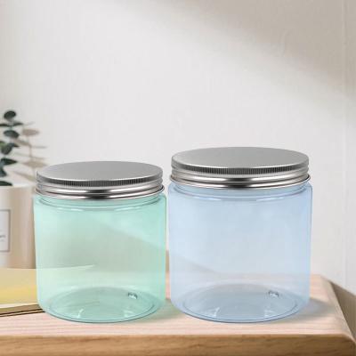 China OEM Transparent 500ml 600ml Plastic PET Food Can Hazelnut Chocolate Gum Candy Silver Lids Jar Container for Dry Fruits for sale