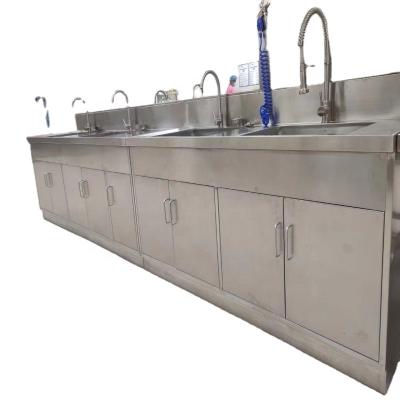 China Custom Stainless Steel Workbench Chemical Resistant Stainless Work Table With Reagent Storage Cabinet for sale