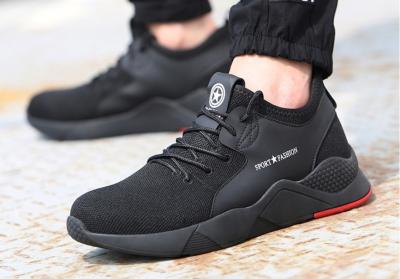 China Slip Resistant Flyknit Fabric Leather Waterproof Steel Toe Work Shoes for sale