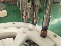 China Pharmaceutical Liquid Filling Machine 30-500ml Volume with GMP Compliance and 99% Capping Success Rate for sale