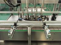 China Flexible Vial Filling Machine for Pediatric Syrups 30-500ml with 40-120 pcs/min Capacity and GMP Compliance for sale