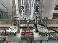 China Custom Automatic Liquid Bottle Filling Machine 30-500ml 4-12 Heads ±0.5% Accuracy for sale