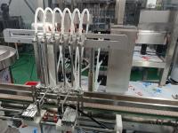 China Industrial Liquid Filling Machine for 100-500ml Containers with ±1% Accuracy and 800kg Weight for sale