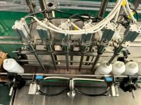 China Automatic Liquid Filling Machine 100-500ml for Plastic Glass Bottles 6-10 Heads GMP for sale