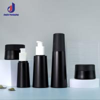 China 100ml 120ml Black Cosmetic Packing PETG  Bottle 50g Plastic Lotion Containers With Caps for sale