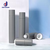 China Cylinder Round Plastic Bottles 60ml 100ml 120ml Gray Cylinder Bottles With Caps for sale