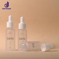 China 1oz 30ml PET Plastic Bottle Luxury Push Button Dropper Bottle Clear Scrub For Serum And Lotion for sale