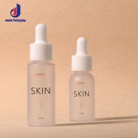 China 1oz 30ml PET Plastic Bottle Luxury Push Button Dropper Bottle Clear Scrub For Serum And Lotion for sale