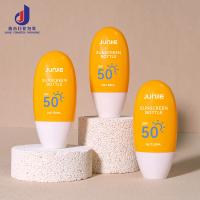 China Flat Round Squeeze Bottle 50ml Sunscreen Container Cosmetic With PE Collar And White Screw Cap for sale