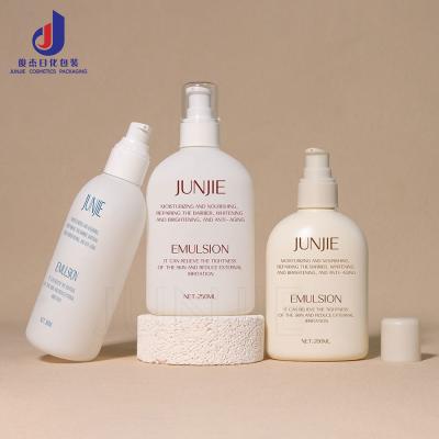 China 300ml 250ml Matte Beige Plastic Bottle White PET Cosmetic Packaging Body Lotion Pump Seal With Unique Design Pump for sale