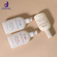 China 300ml 250ml Matte Beige Plastic Bottle White PET Cosmetic Packaging Body Lotion Pump Seal With Unique Design Pump for sale