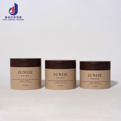 China Empty 200g 300g Coffee Plastic PP Cosmetic Cream Jar Body Scrub Facial Mask Skin Care Makeup Remover Jar Container with Spoon for sale