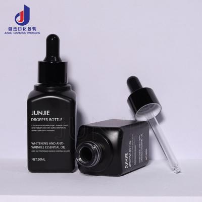 China Customized Logo Wholesale 40ml 50ml Empty Square Essential Oil Plastic Bottle With White Cap Skin Care Serum Dropper Bottle for sale