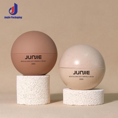 China 200g Body Scrub Container Ball Shaped Skincare Jars Cosmetic Cream Plastic Jar with logo Biodegradable Wheat Straw Jar for sale