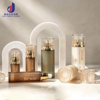China Customized Wholesale As Plastic Cosmetic Airless Pump Spray Bottle with Frosted Coffee for Face Mask and Lotion 30ml-120ml for sale