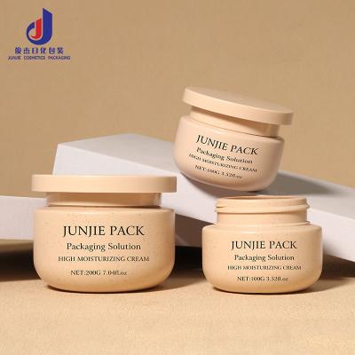 China Custom Color Logo 200ml Luxury HDPE Round Cream Jars Screw Top Empty Skincare & Hair Mask Packaging UV Printed Lids for sale