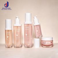 China Cosmetics Packaging Sets Acrylic Jar and Plastic Bottle Custom Clear Polygon Body with Lids for Cream Skin Care Products for sale
