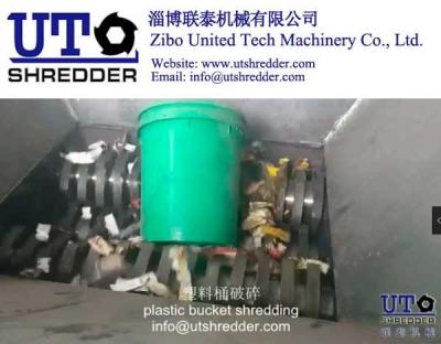 China hot plastic barrel shredder, bucket crushing machine, plastic effective grinder, four shaft shredder from UT Machinery for sale