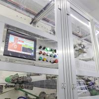 China Womeng Intelligent Sanitary Napkin Making Equipment with Packaging System for sale
