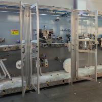 China Small Scale Sanitary Napkin Making Machine 380V 50HZ Ladies Pad Manufacturing Machine for sale