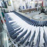 China Womeng Intelligent Equipment Full Servo Sanitary Napkin Production Line with CE for sale