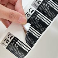 China Custom Printing Logo Waterproof Silver Paper Electric Product LED Label Sticker Vinyl Laptop Charger Sticker Logo Roll for sale