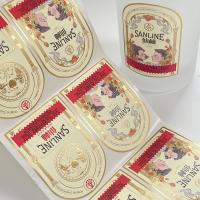 China Custom Printing Texture Gold Foil Embossed Sticker Perfume UV Logo Label Printing Wine Label for sale