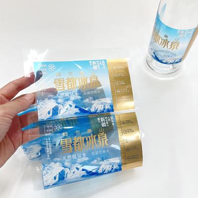 China OEM Custom Clear Gold Foil Logo Water Label  Rectangle Vinyl Self-adhesive Transparent  Canned Food Jar Label Sticker Roll for sale
