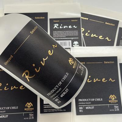 China Custom Printed Black Gold Foil Embossed Liquor Logo Label Sticker Texture Paper Wine Whisky Labels Sticker 2024r for sale