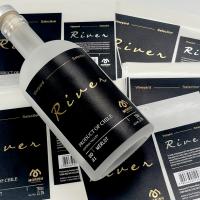 China Custom Printed Black Gold Foil Embossed Liquor Logo Label Sticker Texture Paper Wine Whisky Labels Sticker 2024r for sale