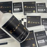 China Custom Printed Black Gold Foil Embossed Liquor Logo Label Sticker Texture Paper Wine Whisky Labels Sticker 2024r for sale