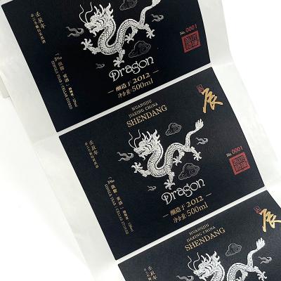 China Custom Size Self Adhesive Printing Wine Bottle Embossed Label Matte Rectangle Texture Paper Gold Foil Roll Sticker for sale