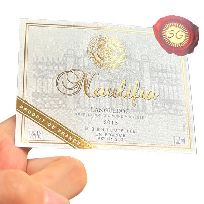 China Customized Special Varnish Spot UV Texture Paper Hot Gold Wine Sticker Color Printing Packaging  Label for sale