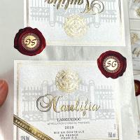 China Customized Special Varnish Spot UV Texture Paper Hot Gold Wine Sticker Color Printing Packaging  Label for sale
