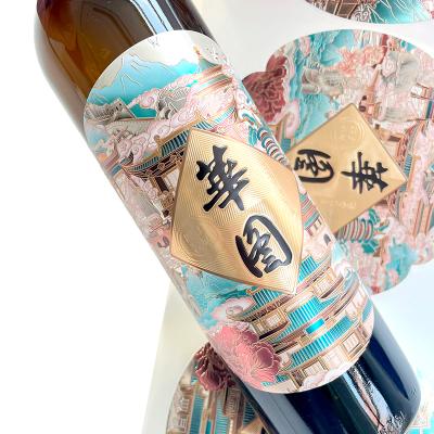 China Custom Free Design White Metallic Vinyl Tag Label Logo Premium Wine Bottle Aluminium Foil Gold Stamped Embossing Sticker for sale