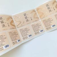 China Custom Adhesive Vinyl Roll Texture Label Sticker Die Cut Gold Foil Stamping for Beverage Bottle Packaging for sale