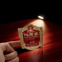 China Custom Luxury Red Liquor Spirit Bottle Label Metallic Embossed Soft Aluminum Textured Paper Wine Packaging Label for sale