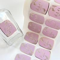 China Custom Embossed Logo Gold Aluminum Stamping Pink Sticker 50ml Candle Sticker Perfume Glass Bottle Label Sticker 3d 2025 for sale