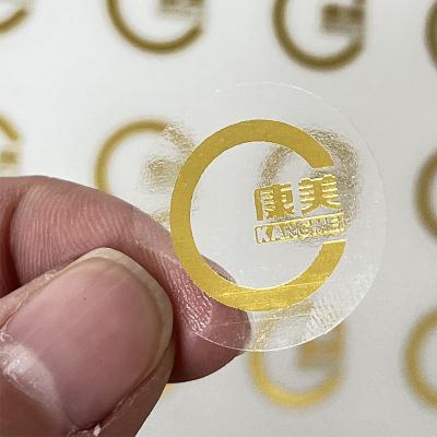 China Custom Gold Foil Logo Vinyl Sticker Sheet Transparent and Waterproof Clear Circle Seal for Cosmetic Bottles Candles Crafts for sale